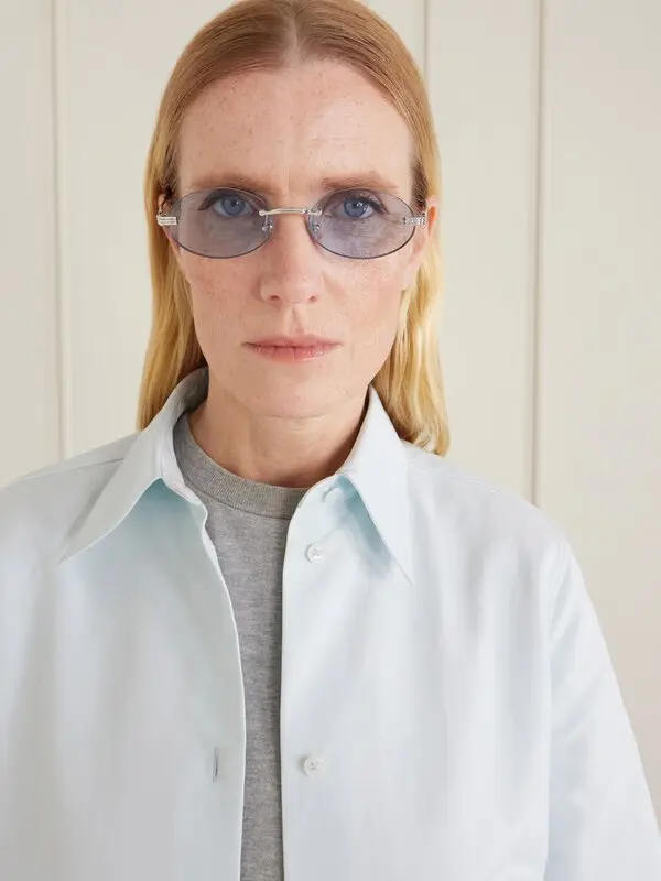 Cartier Rimless Oval Metal Sunglasses