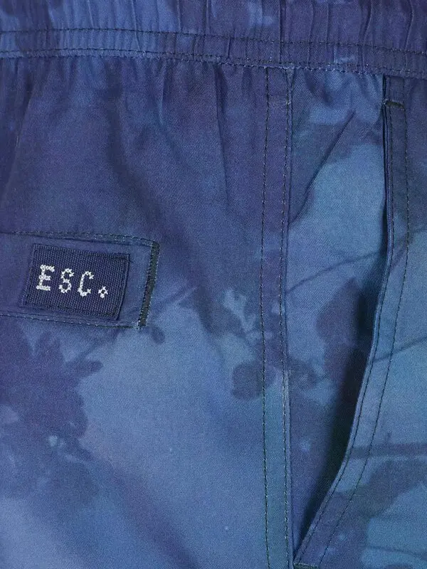 ESCAPISTA Floral Print Swim Shorts