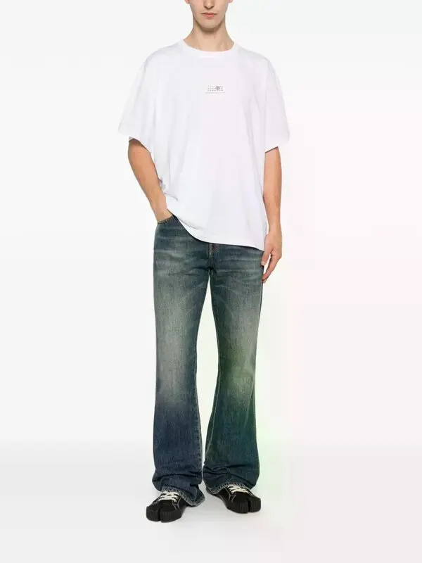 NUMERI Faded-effect Whiskered Jeans