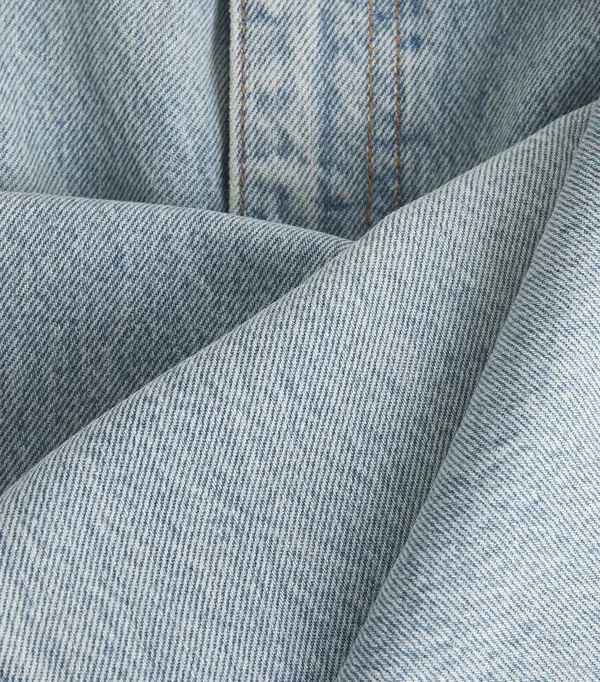 FRAME The Bow High-rise Barrel-leg Jeans