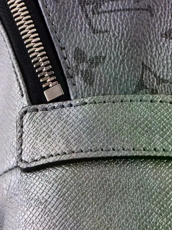 LOUIS VUITTON Discovery Monogram Taigarama Pm Backpack