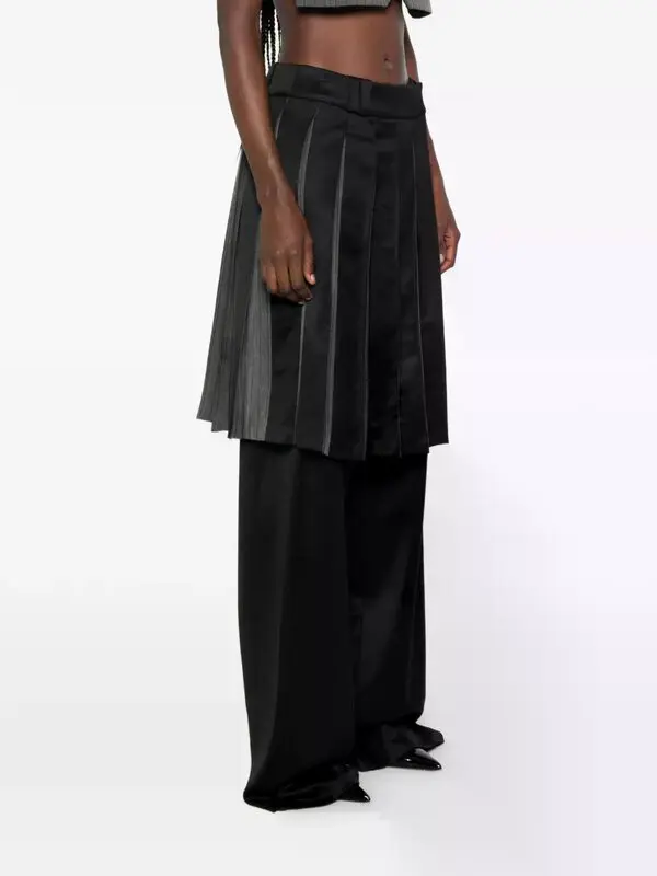 VESTIAIRE D'UN OISEAU LIBRE Pleated Panelled Trousers