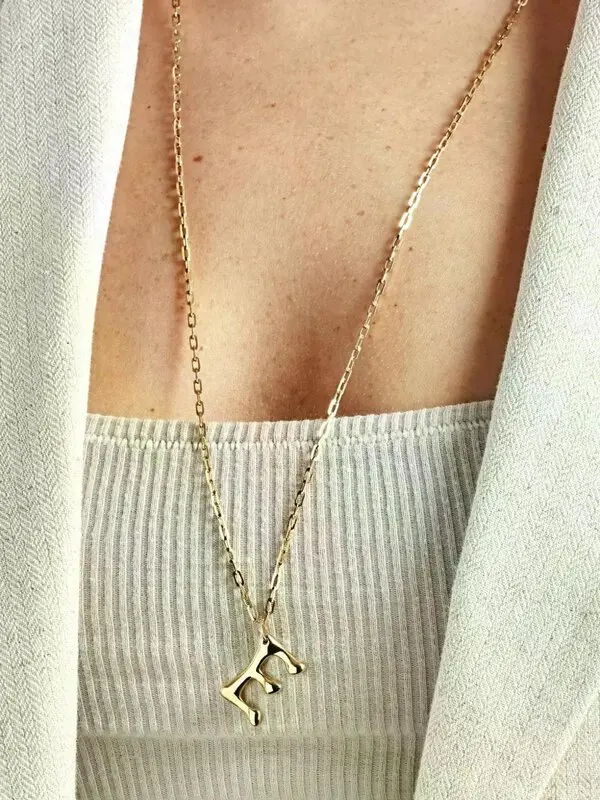 JEWELS AFICIONADO Polished Yellow Initial Pendant