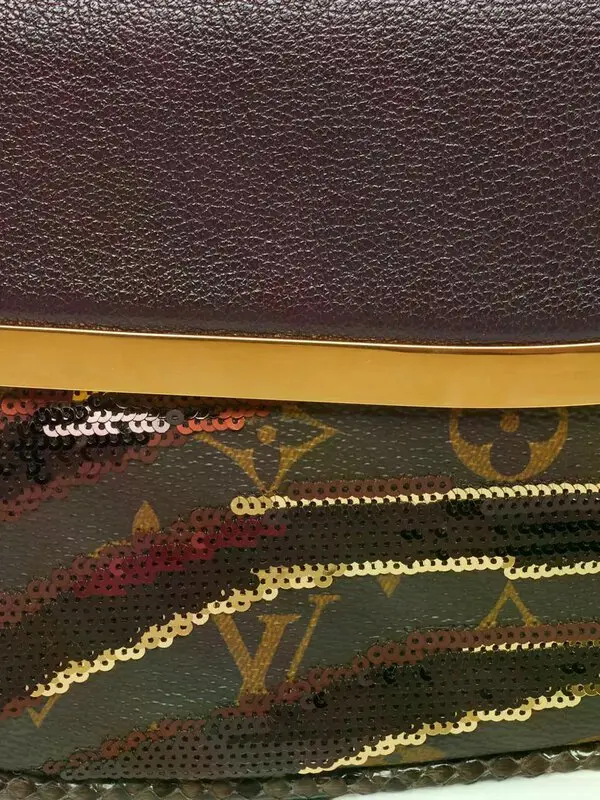 LOUIS VUITTON Monogram Sauvage Tigre Clutch Bag