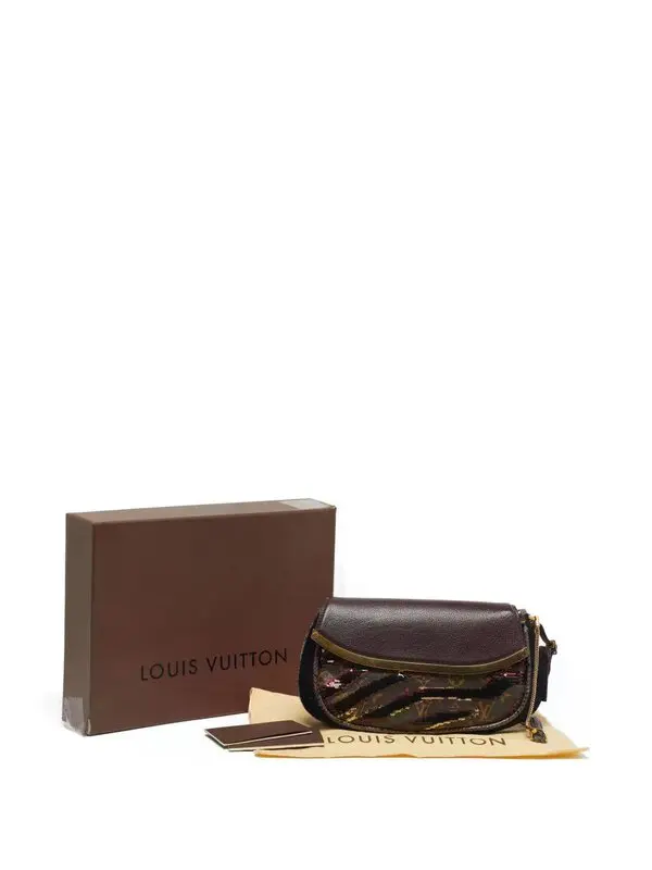 LOUIS VUITTON Monogram Sauvage Tigre Clutch Bag