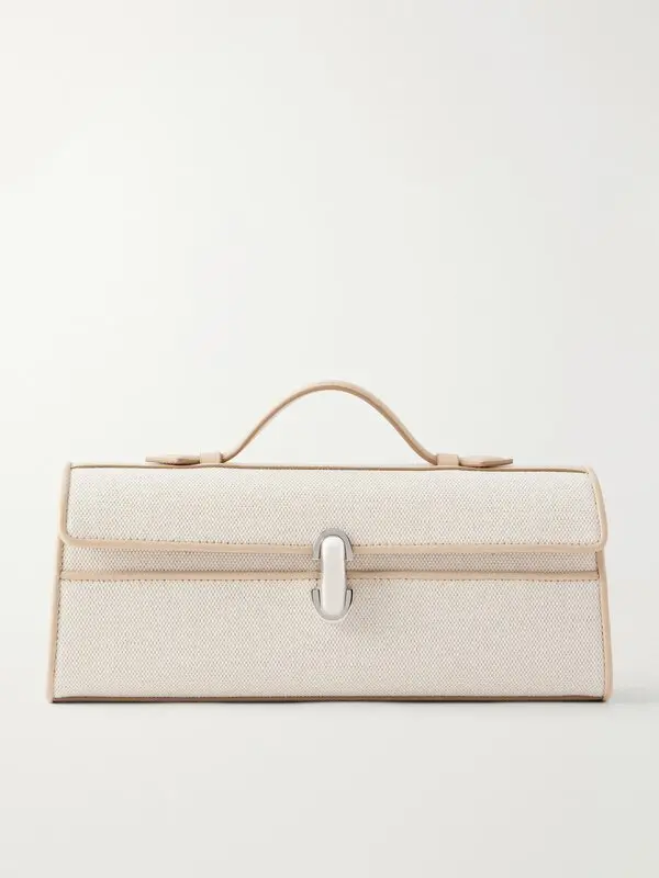 Savette Slim Symmetry Clutch In Canvas And Leather