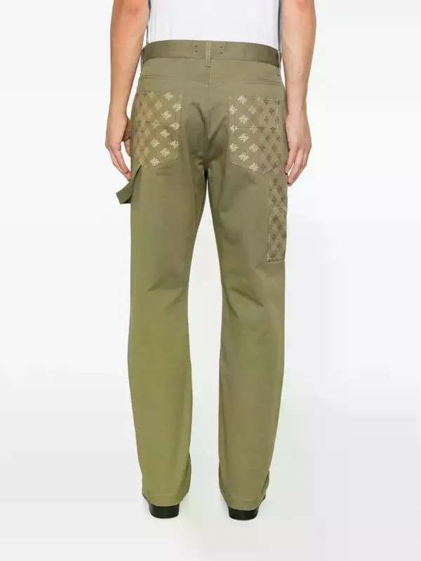 Amiri Monogram-pattern Panelled Trousers