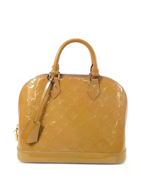 LOUIS VUITTON Monogram Vernis Alma Handbag - Yellow
