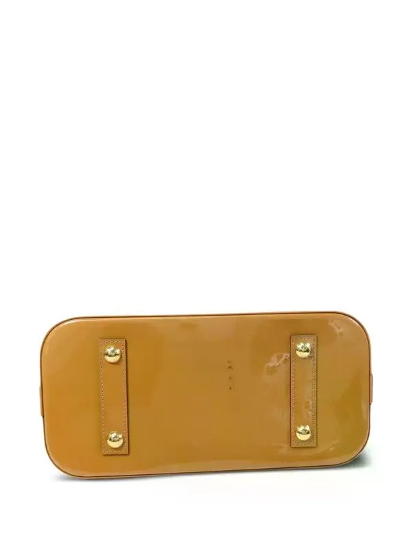 LOUIS VUITTON Monogram Vernis Alma Handbag - Yellow