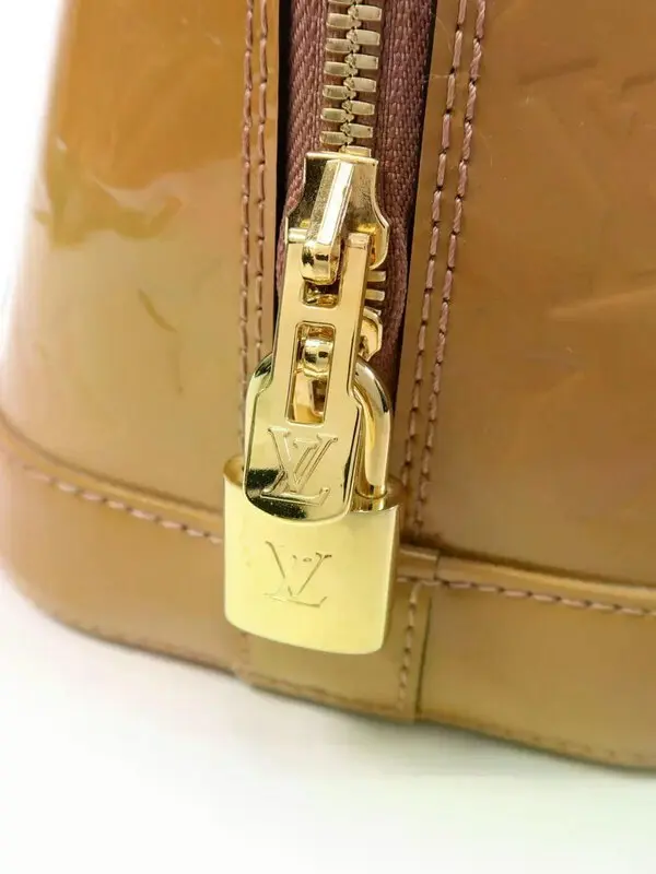 LOUIS VUITTON Monogram Vernis Alma Handbag - Yellow