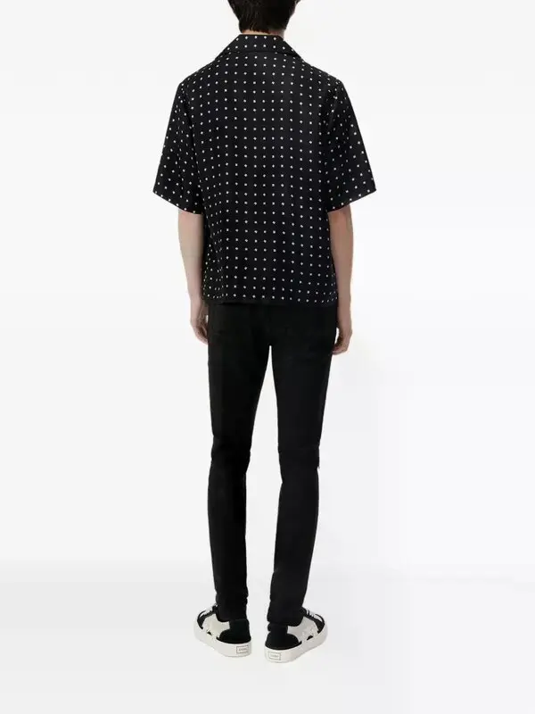 Amiri Coated Distressed Effect Jeans
