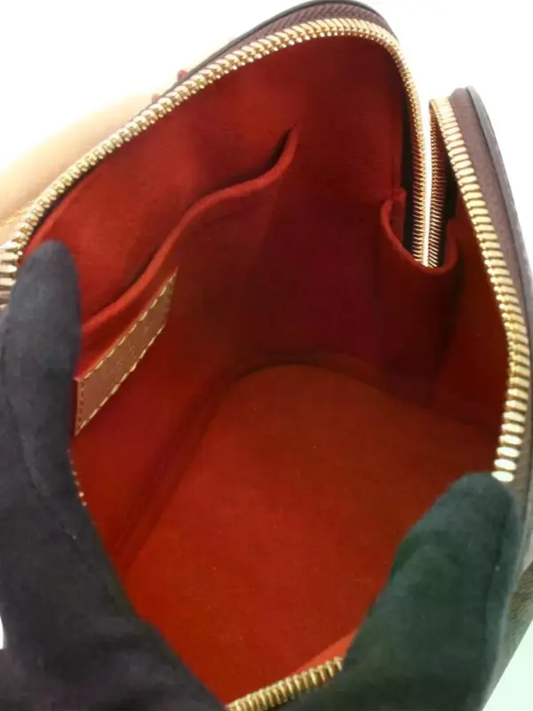 LOUIS VUITTON Monogram Alma Backpack
