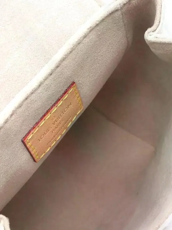 LOUIS VUITTON Tiny Monogram Backpack