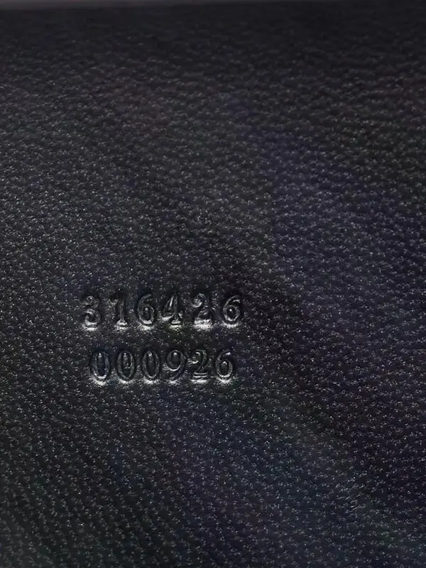 Alexander McQueen Skull Clasp Clutch Bag