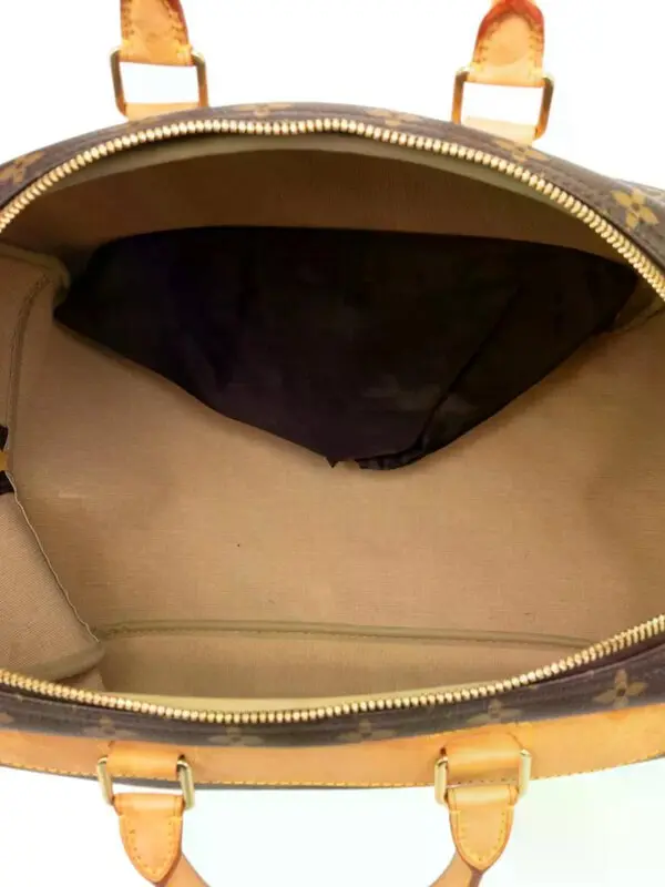 LOUIS VUITTON Monogram Evasion Travel Bag