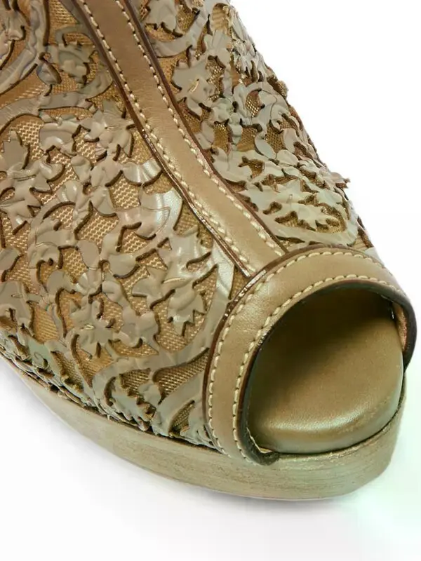 CHRISTIAN LOUBOUTIN Laser Cut Pumps