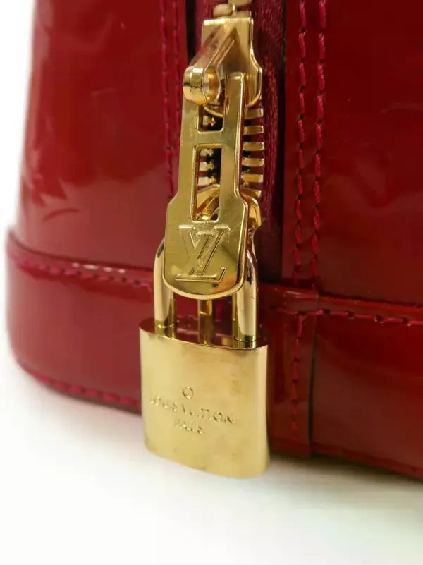 LOUIS VUITTON Monogram Vernis Alma Handbag - Red