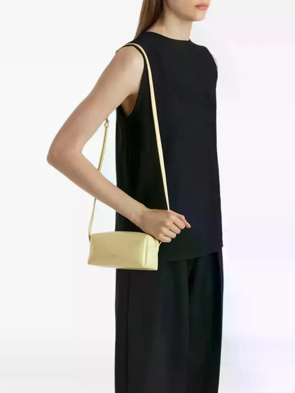 Khaite Mini Kye Crossbody Bag In Pale Crackle-patent Leather - Yellow