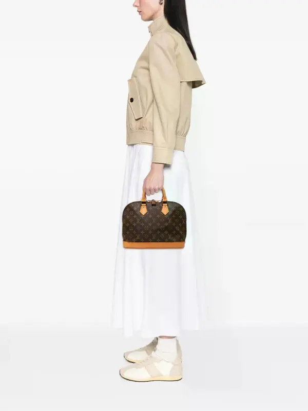 LOUIS VUITTON Monogram Alma Pm Handbag