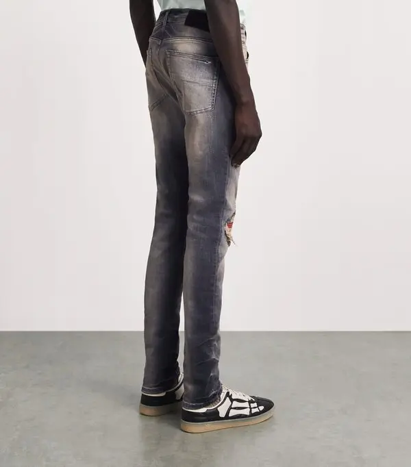 Amiri Ripped Skinny Jeans With Flannel Inlays