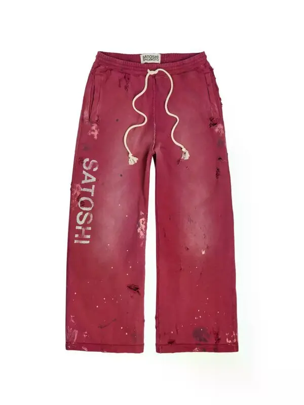 SATOSHI NAKAMOTO Distressed Paint-splatter Track Pants - Red