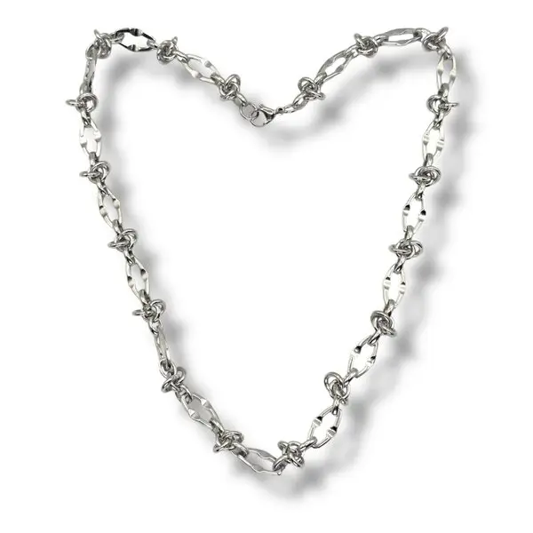 JAGGED HALO JEWELRY Barbed Love Knot Necklace - Silver