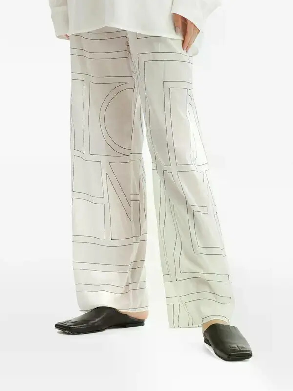 TOTEME Wide-leg Trousers With Logo Embroidery - White