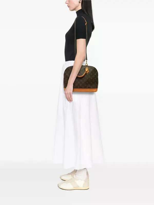LOUIS VUITTON 1996 Monogram Alma Pm Handbag - Brown