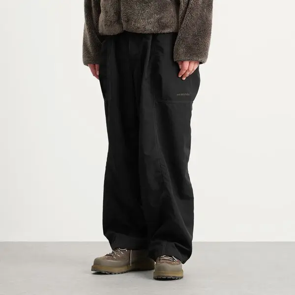AND WANDER Crinkled Nylon Trousers