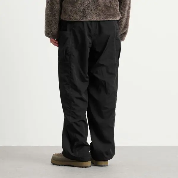 AND WANDER Crinkled Nylon Trousers
