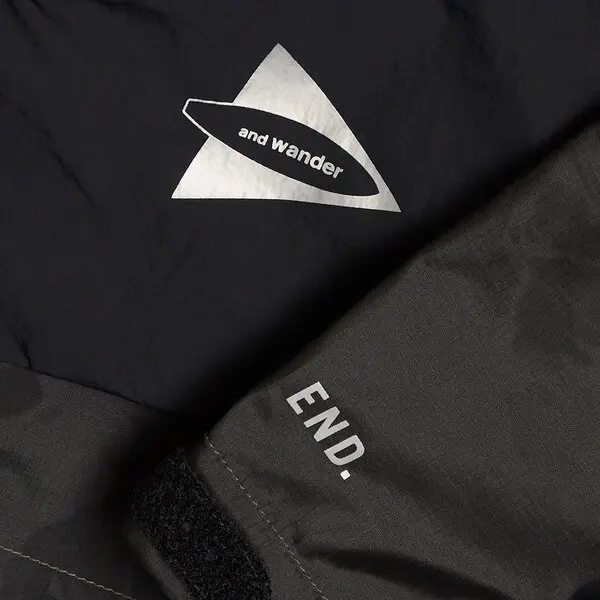 AND WANDER End. X Nylon Print Jacket