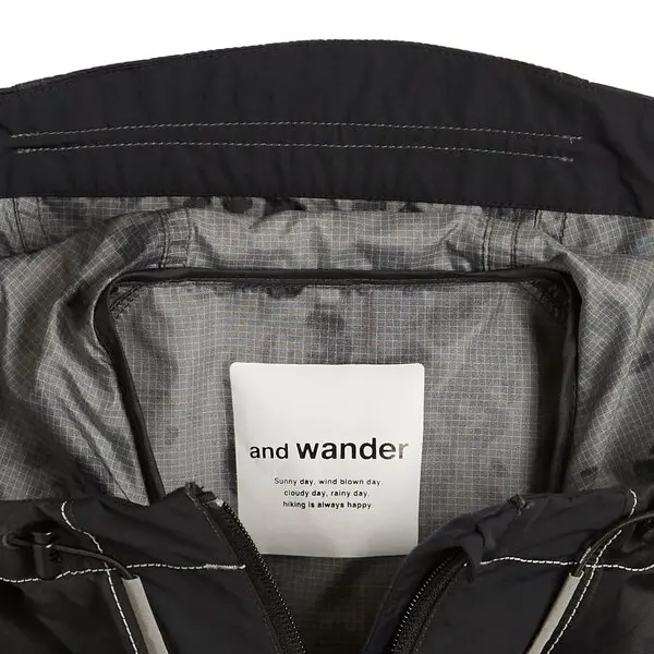 AND WANDER End. X Nylon Print Jacket