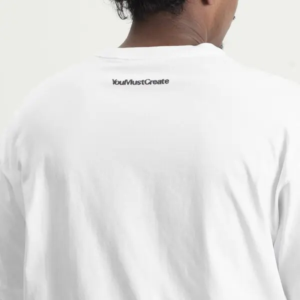 You Must Create Jumbled Logo Print Triple T Shirt