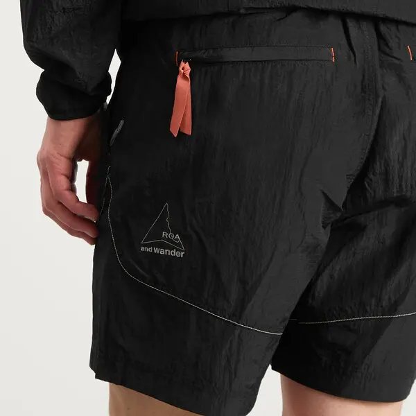 AND WANDER X Roa Ripstop Wind Shorts