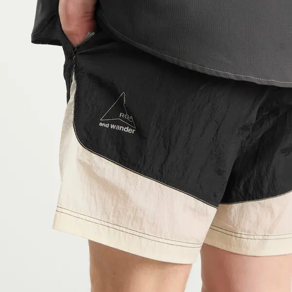 AND WANDER X Roa Ripstop Wind Shorts