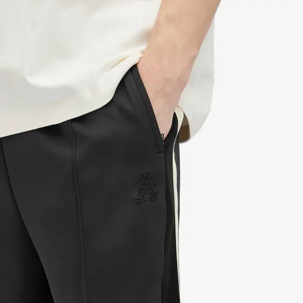 ABOUT:BLANK Monogram Track Pants