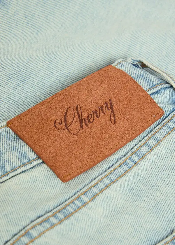 CHERRY LOS ANGELES Distressed Wide-leg Jeans