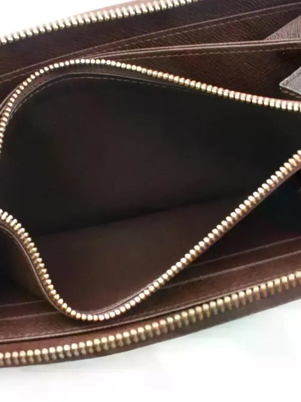 LOUIS VUITTON 2012 Damier Ebene Zippy Wallet