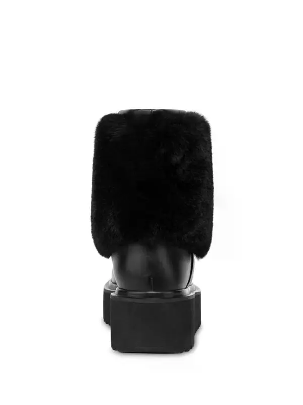 Moschino Logo-embossed Slip-on Boots