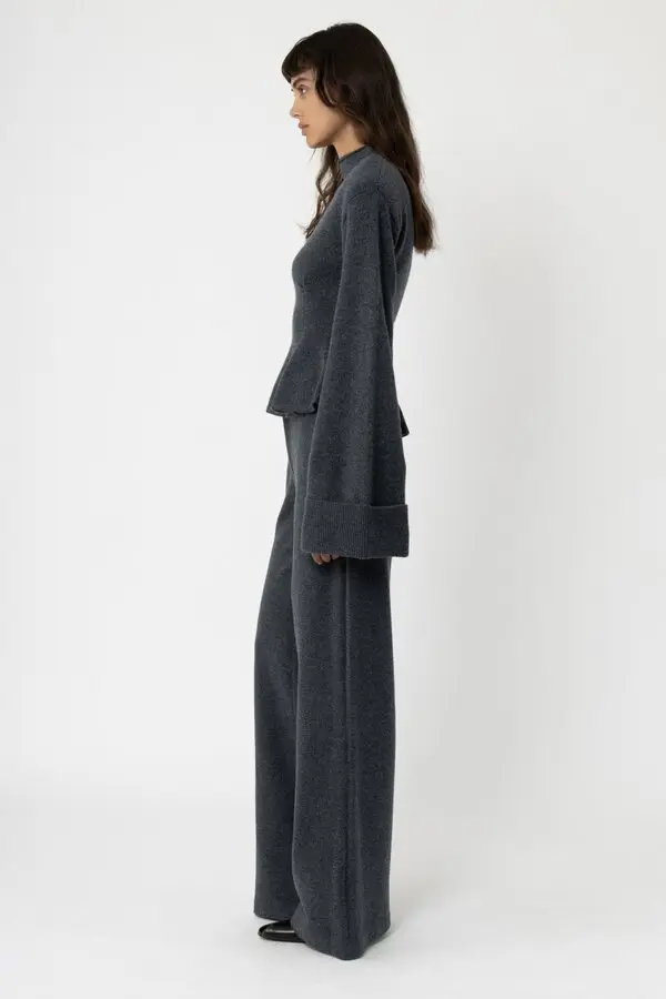 Arakii Knitted Peplum Turtleneck
