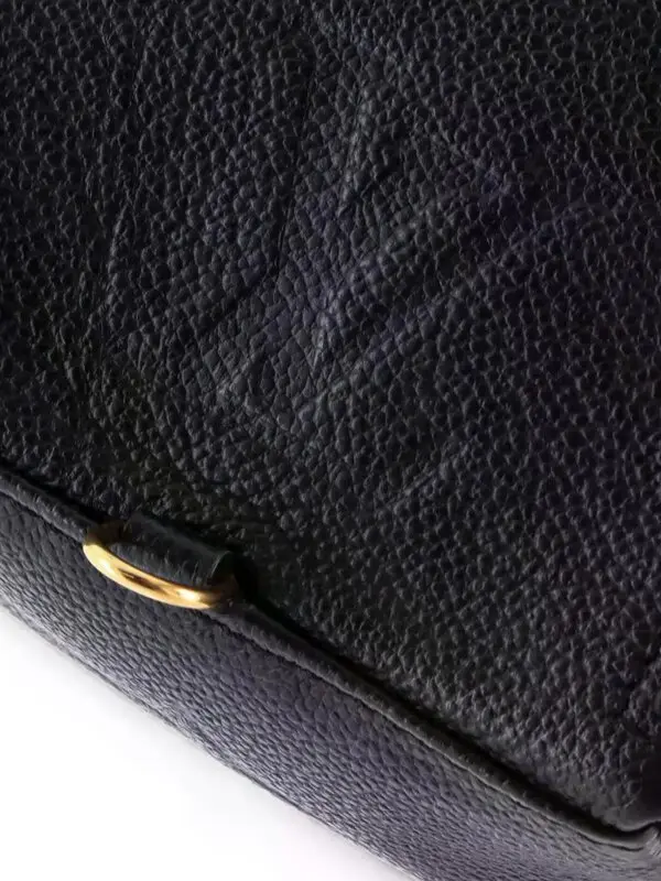 LOUIS VUITTON Tiny Monogram Empreinte Giant Backpack