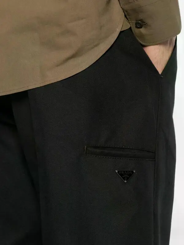 Prada Pressed-crease Logo-plaque Trousers
