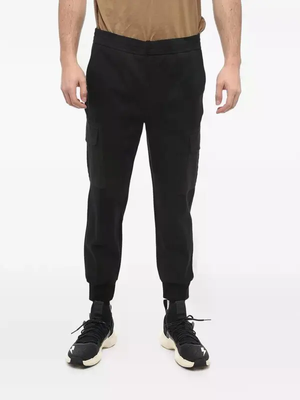 Neil Barrett Low-rise Skinny-fit Tapered Trousers - Black