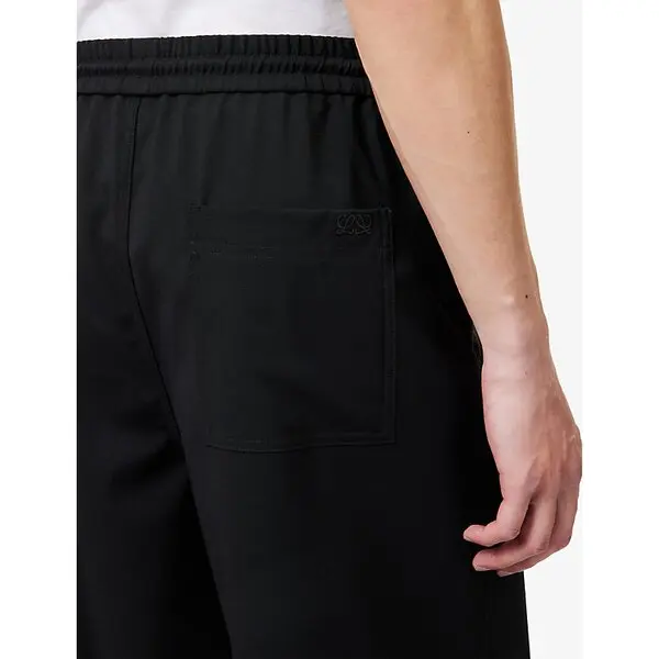 Loewe Anagram-embroidered Relaxed-fit Wool Trousers - Black