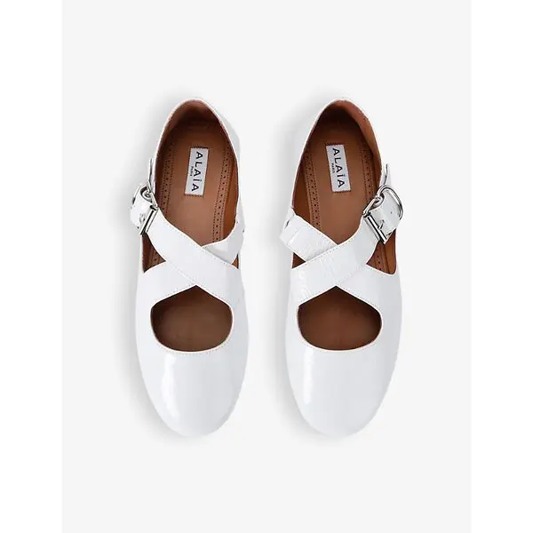 Alaïa Criss Cross Patent-leather Ballet Flats