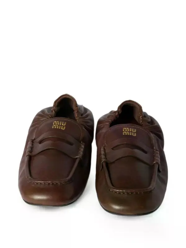 Miu Miu Logo-embossed Penny Loafers