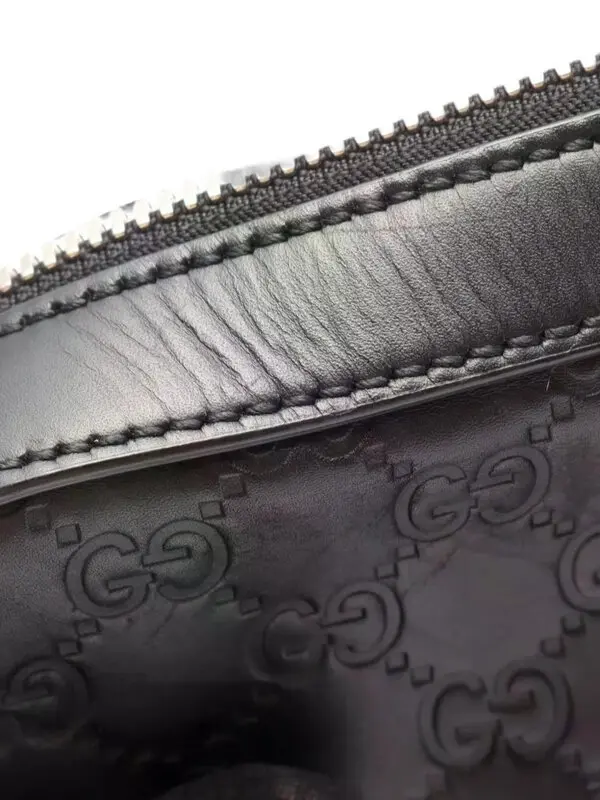 Gucci Embossed Logo Leather Briefcase