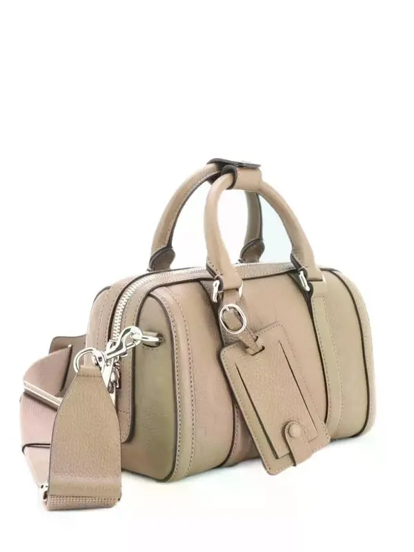 Gucci Jumbo Gg Embossed Leather Mini Travel Bag - Brown