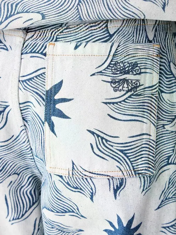 NEVER FULLY DRESSED Sun-print Jeans