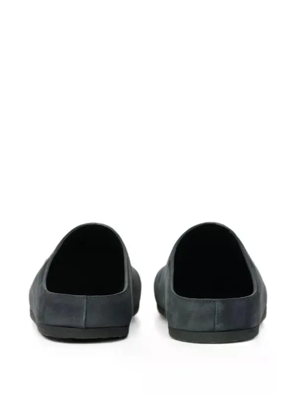Studio Nicholson Wearing Leather Clogs
